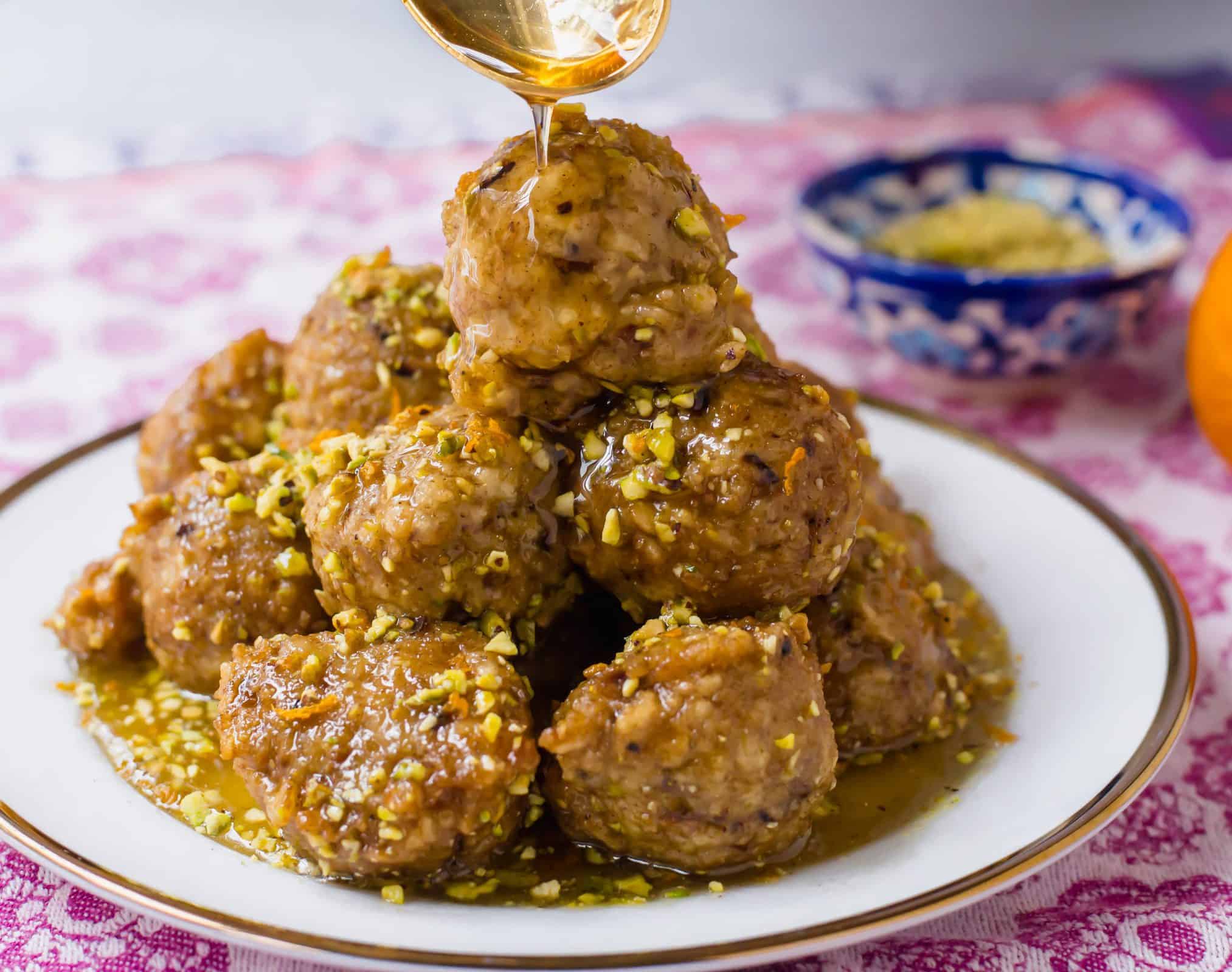 Baklava Bimuelos: Matzo Donuts with Pistachios and Rose Water Syrup